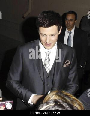 "Glee" star Cory Monteith looks handsome in a suit and tie as he signs ...