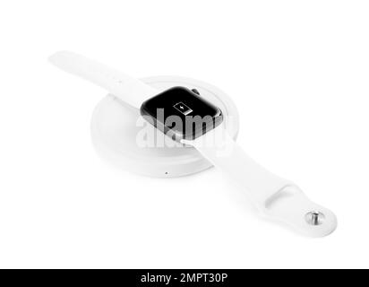Smartwatch charging with wireless pad isolated on white Stock Photo - Alamy