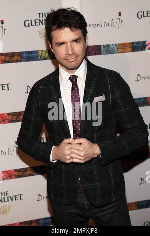 Actor Matthew Settle poses for photographers at the 9th Annual 'Dressed ...