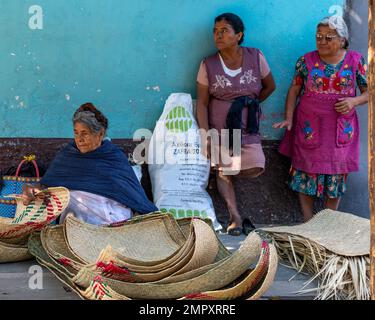 Three indigenous Zapotec women in traditional dress of embroidered ...