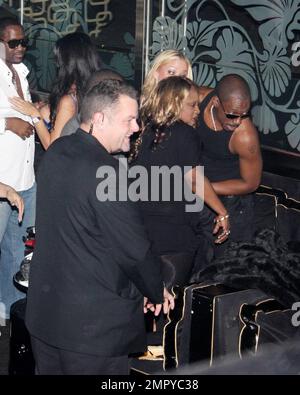 Actor Eddie Murphy enjoys being surrounded by a bevy of beauties during ...