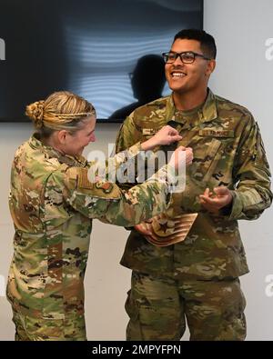 Col. Catherine Logan, JBAB and 11th Wing commander, cuts a cake ...