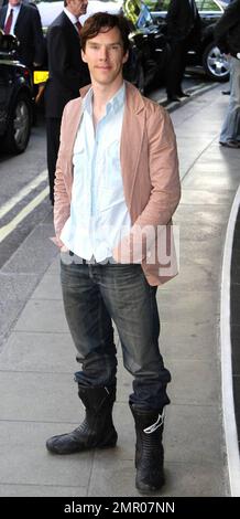 Benedict Cumberbatch poses for the camera at the English National ...
