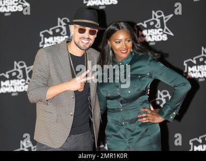 French singers Youssef Akdim "Lartiste'", left, and Awa Imani arrive at ...