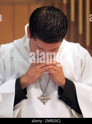 POOL PHOTO - Father Alberto Cutie is greeted by crowds outside the ...