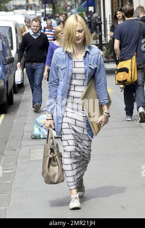 Fearne Cotton wears a grey brick wall-patterned dress with sneakers as ...