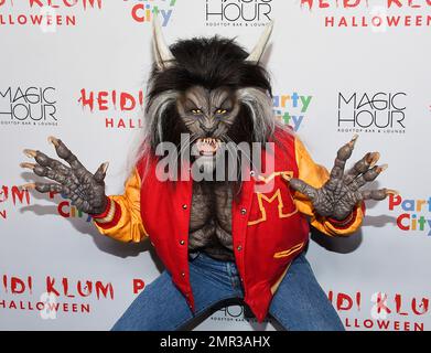 Model Heidi Klum, dressed as a werewolf, performs a dance from Michael ...