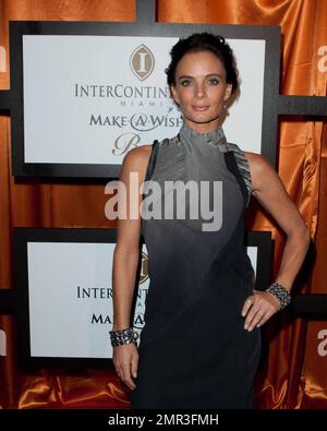 English actress Gabrielle Anwar walks the red carpet with her boyfriend ...