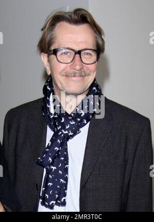 Actor Gary Oldman arriving at LAX airport for a flight. Los Angeles, CA ...