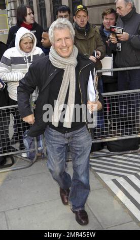 Veteran UK television star George Layton is all smiles as he waves and ...