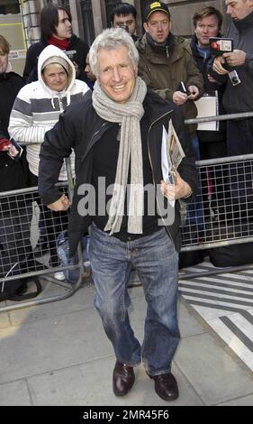 Veteran UK television star George Layton is all smiles as he waves and ...