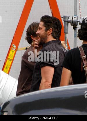 Gerard Butler on the set of 'The Bounty Hunter' filming a parade scene ...