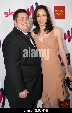 Chaz Bono and Jennifer Elia pose for photographers at 22nd Annual GLAAD ...