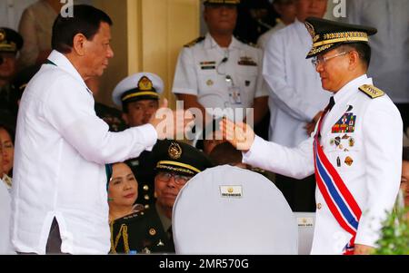 Retiring Philippine Armed Forces Chief Gen. Eduardo Ano, left, and new ...