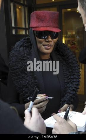 Grace Jones signs autographs for her loyal fans outside the BBC. As ...