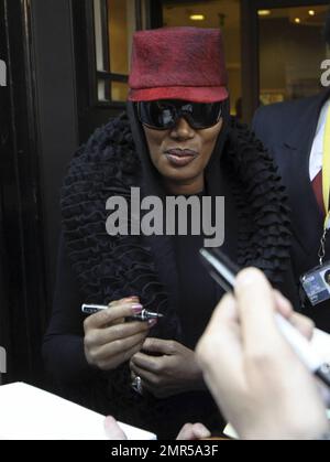 Grace Jones signs autographs for her loyal fans outside the BBC. As ...