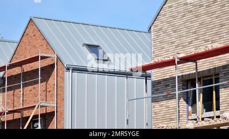 Terraced houses under construction. Housing estate development under ...
