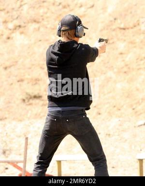 Hayden Christensen traded in his light saber for a semi-automatic hand ...