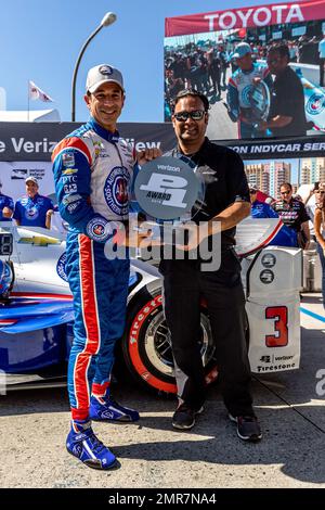 Race car driver Bobby Unser is shown with his wife Norma in the winner ...