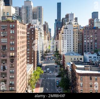Overhead view First Avenue with traffic drivings through the buildings ...