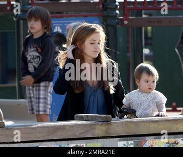 Actress Isla Fisher plays with her adorable daughter Olive Cohen, who ...