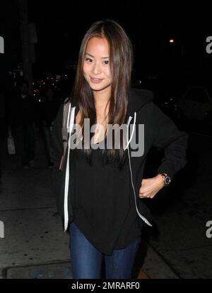 Exclusive!! Actress Jamie Chung smiles for the camera during a night ...
