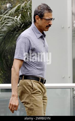 Jeff Goldblum sports a moustache and some large-framed glasses during a ...