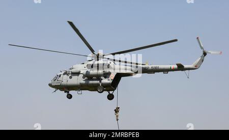 An Indian Air Force (IAF) commando demonstrates slithering skills as ...
