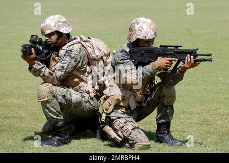 Indian Air Force's Garud commandos display their skills during an event ...