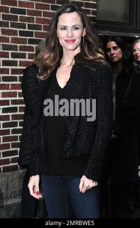 Jennifer Garner shows off her cool leather boots and shimmering jacket ...