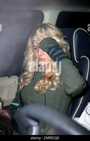 Jessica Simpson reveals her new curly hairstyle as she leaves her ...