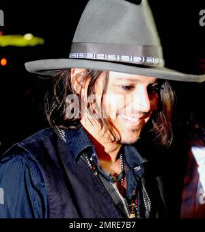 Johnny Depp is all smiles as he arrives at Pink Taco in West Hollywood ...