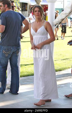 Joss Stone walks around at Coachella 2009 and playfully pokes her ...