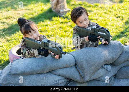 Happy children playing cs Stock Photo - Alamy