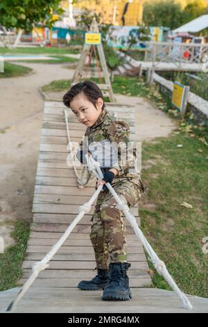 Happy boy playing cs Stock Photo - Alamy