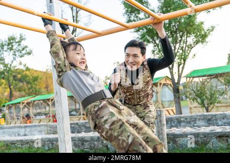 Father took son play cs Stock Photo - Alamy