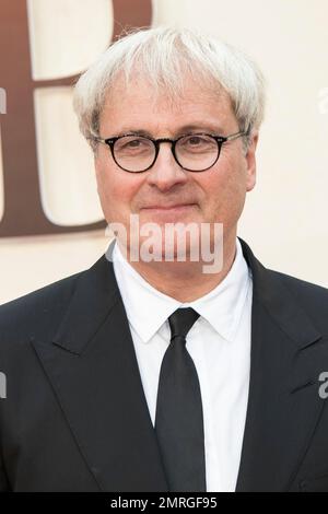 Director Simon Curtis poses for photographers upon arrival at the World ...