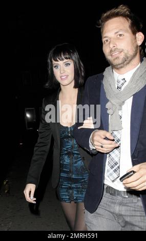 Singer Katy Perry signs autographs as she leaves Bar Deluxe with ...