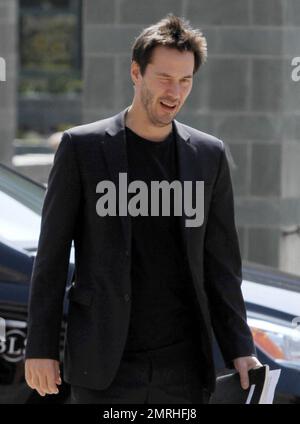 EXCLUSIVE!! Actor Keanu Reeves wears all black paired with some clunky ...