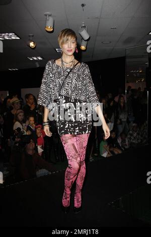 Decked out in some 'Material Girl' clothes including a light blue denim ...