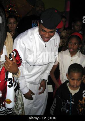 Rapper Nelly signs autographs for young fans at the Kids Choice Awards ...