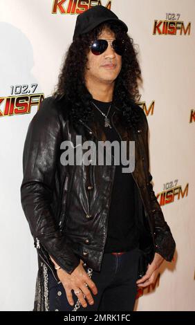 Slash poses on the red carpet during the KISS FM Jingle Ball 2010 held ...