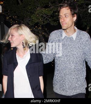Actress Kirsten Dunst and boyfriend, Rilo Kiley drummer Jason Boesel ...