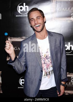 Josh Strickland (L) poses for photographers at Gallery Nightclub inside ...