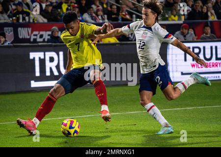 United States of America defender John Tolkin (12) wins possession ...
