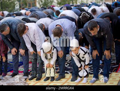 Kosovar children attend Eid al-Adha prayers outside Sultan Mehmet Fatih ...