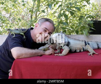Exclusive!! Henry Lizardlover snuggles up with some of his lizard ...