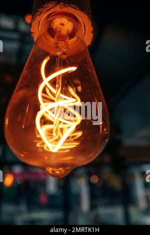 Closeup shot of a yellow light bulb Stock Photo - Alamy