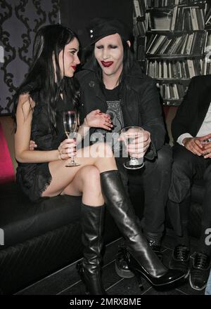 Marilyn Manson, with his new girlfriend model Isani Griffith, attends a ...