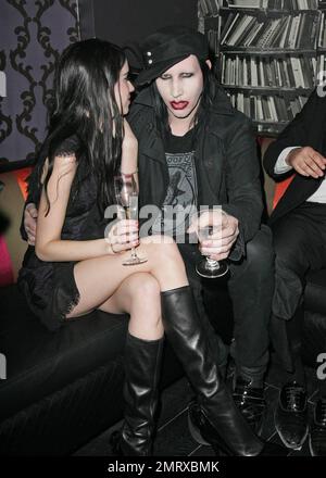 Marilyn Manson, with his new girlfriend model Isani Griffith, attends a ...